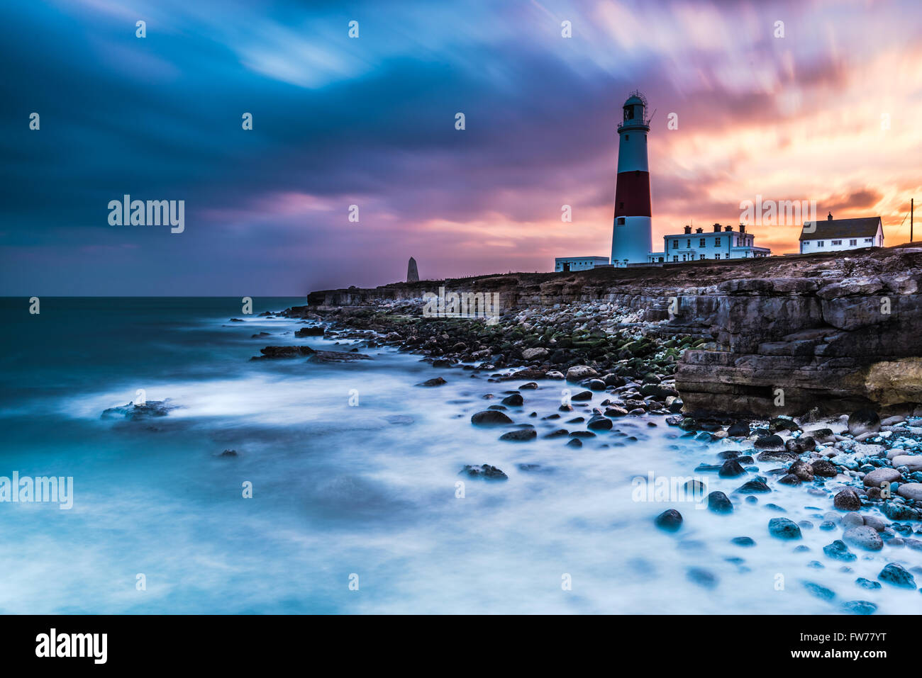 Time lapse of dramatic sunset and Portland Bill lighthouse, on rocky ...