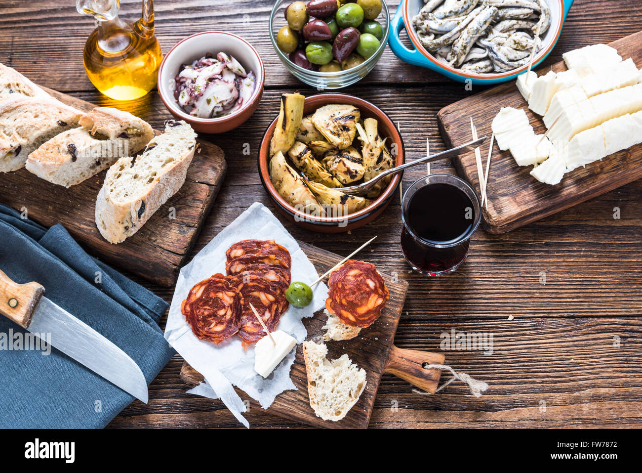 Sharing authentic spanish tapas with friends in restaurant or bar. View ...