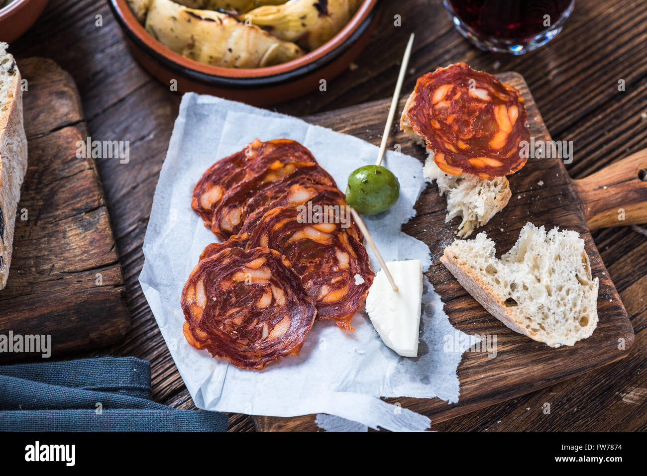 Sharing authentic spanish tapas with friends in restaurant or bar. View ...