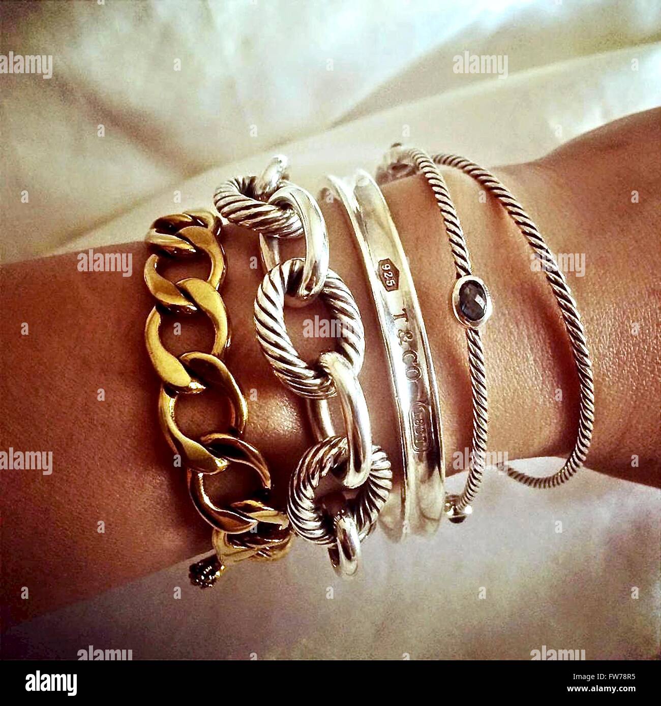 Silver bangles hi-res stock photography and images - Alamy