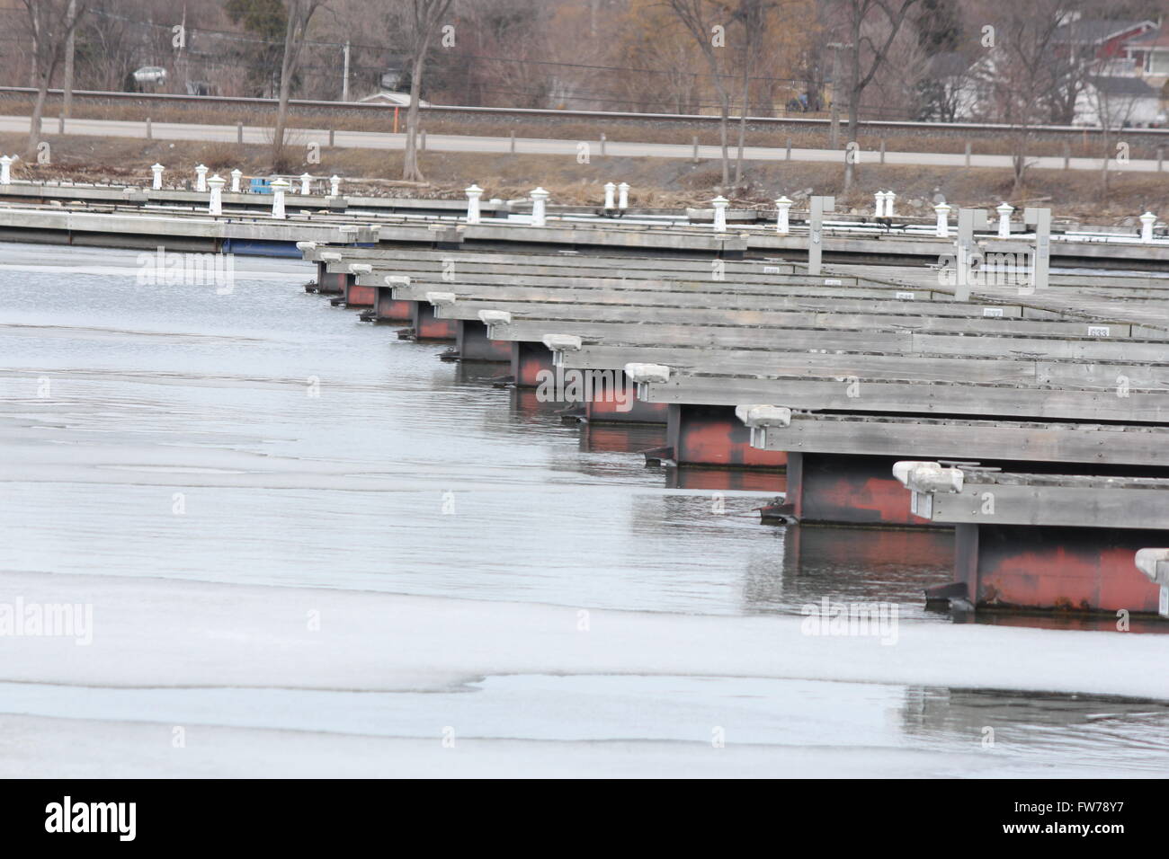 Empty boat slips during the early spring season in North America ...