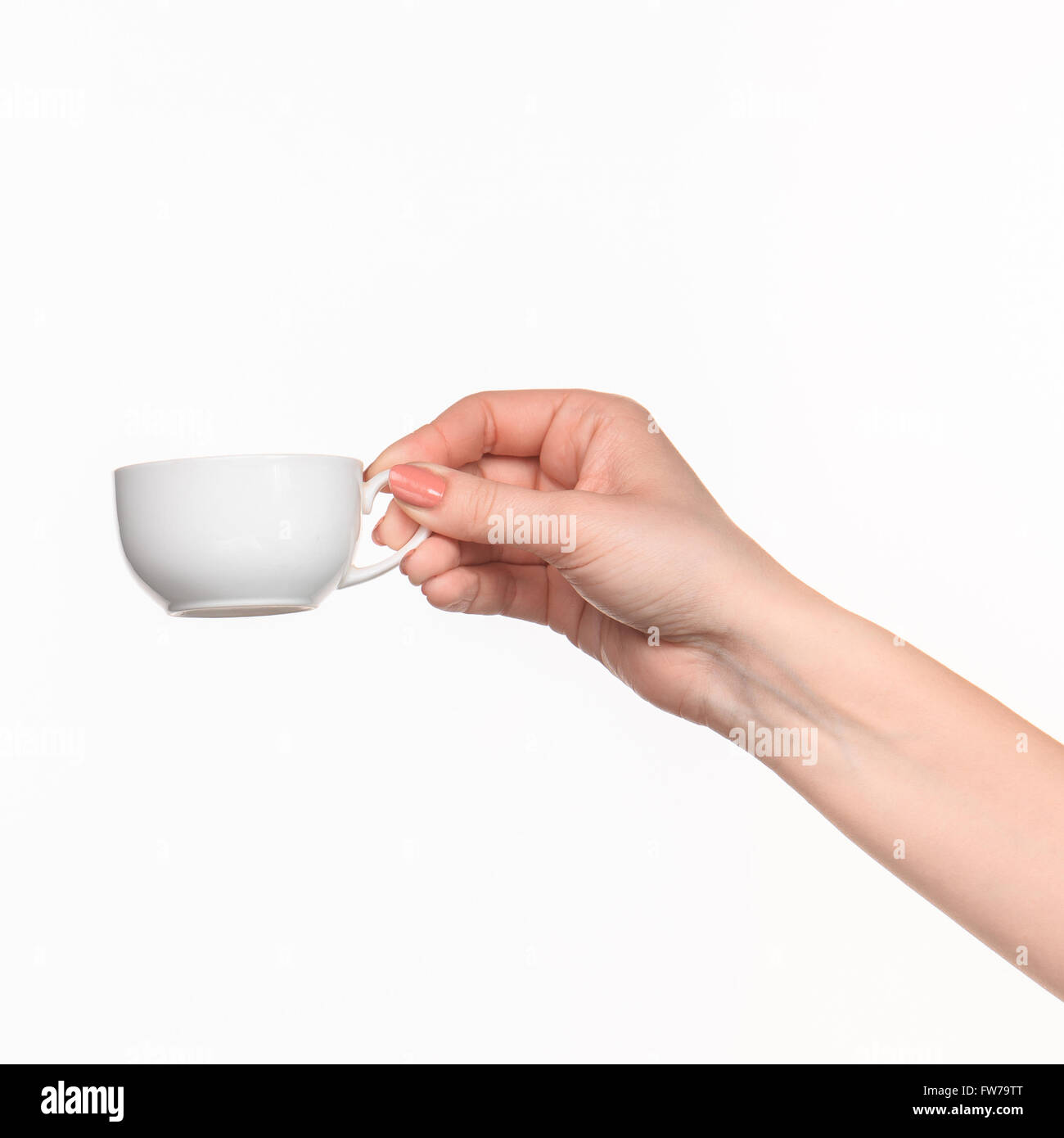 Woman hand with cup on white background Stock Photo - Alamy