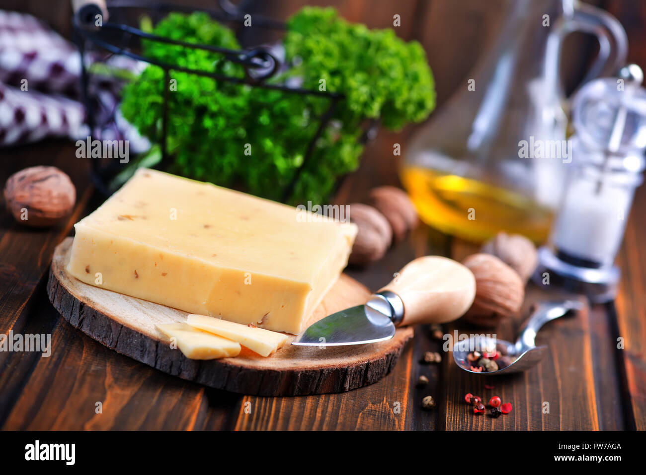 cheese on board and on a table Stock Photo - Alamy