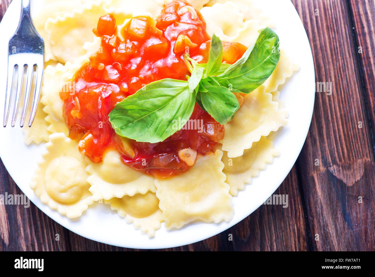 ravioli with tomato sauce on the plate Stock Photo - Alamy