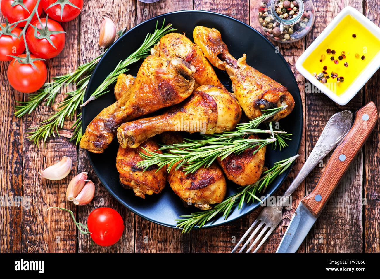 fried chicken on plate and on a table Stock Photo - Alamy