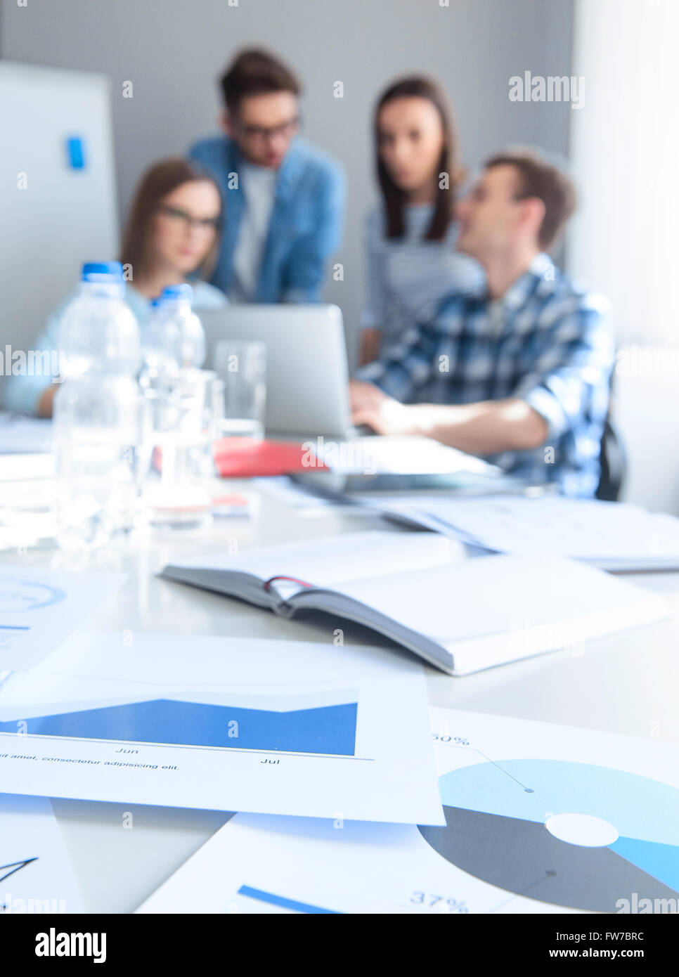 Papers and notebook lying on the table Stock Photo - Alamy