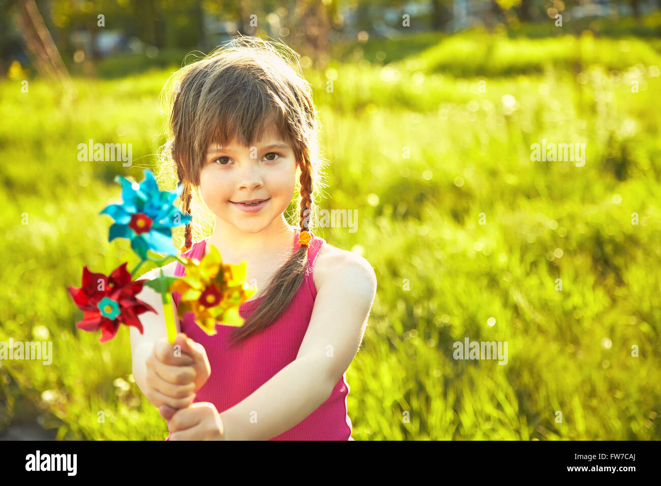 girl with pinwheel Stock Photo - Alamy