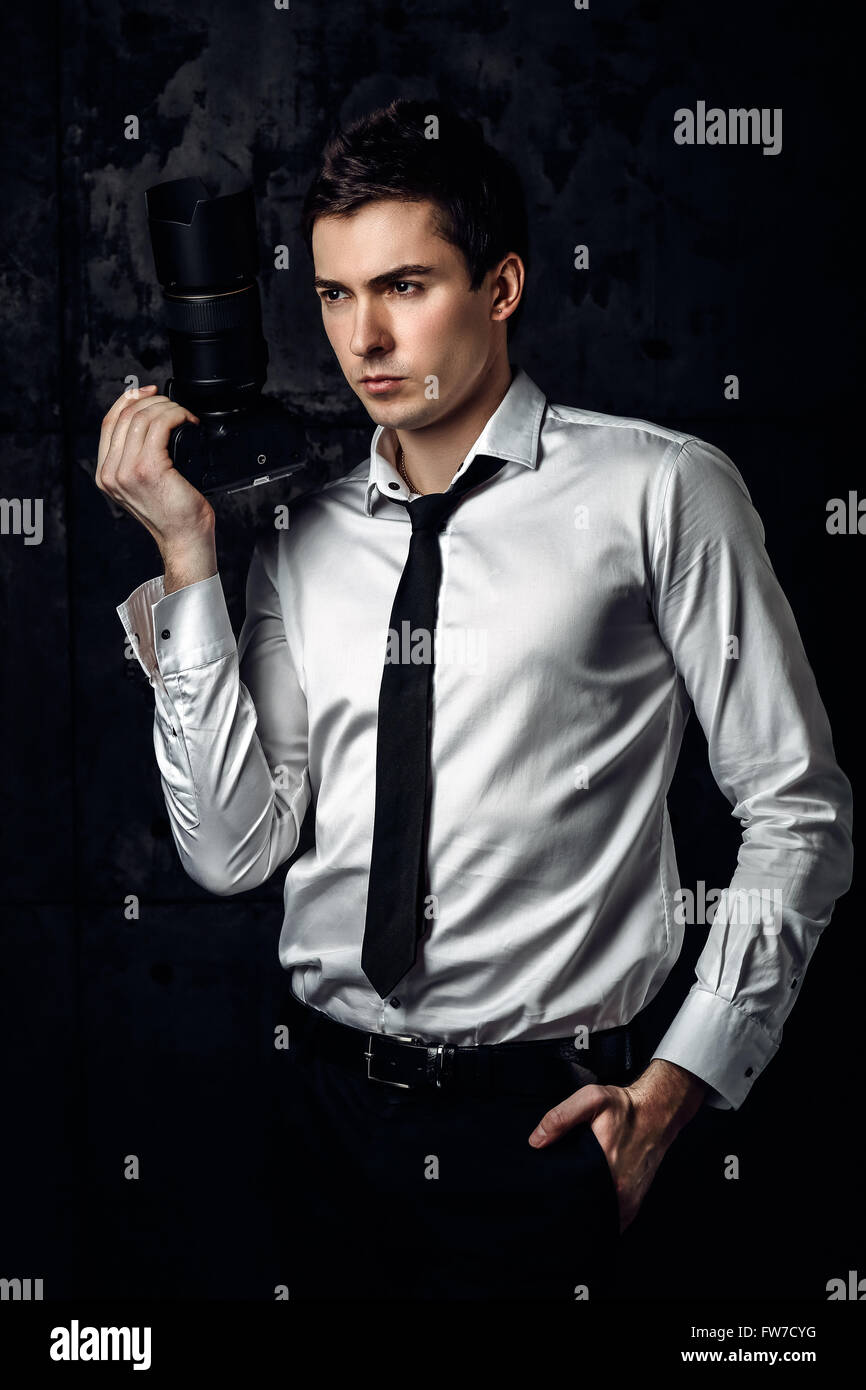 Serious professional photographer Stock Photo - Alamy