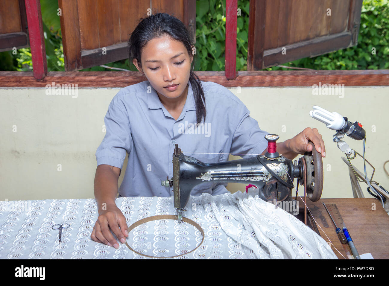 Person using white sewing machine hi-res stock photography and images ...