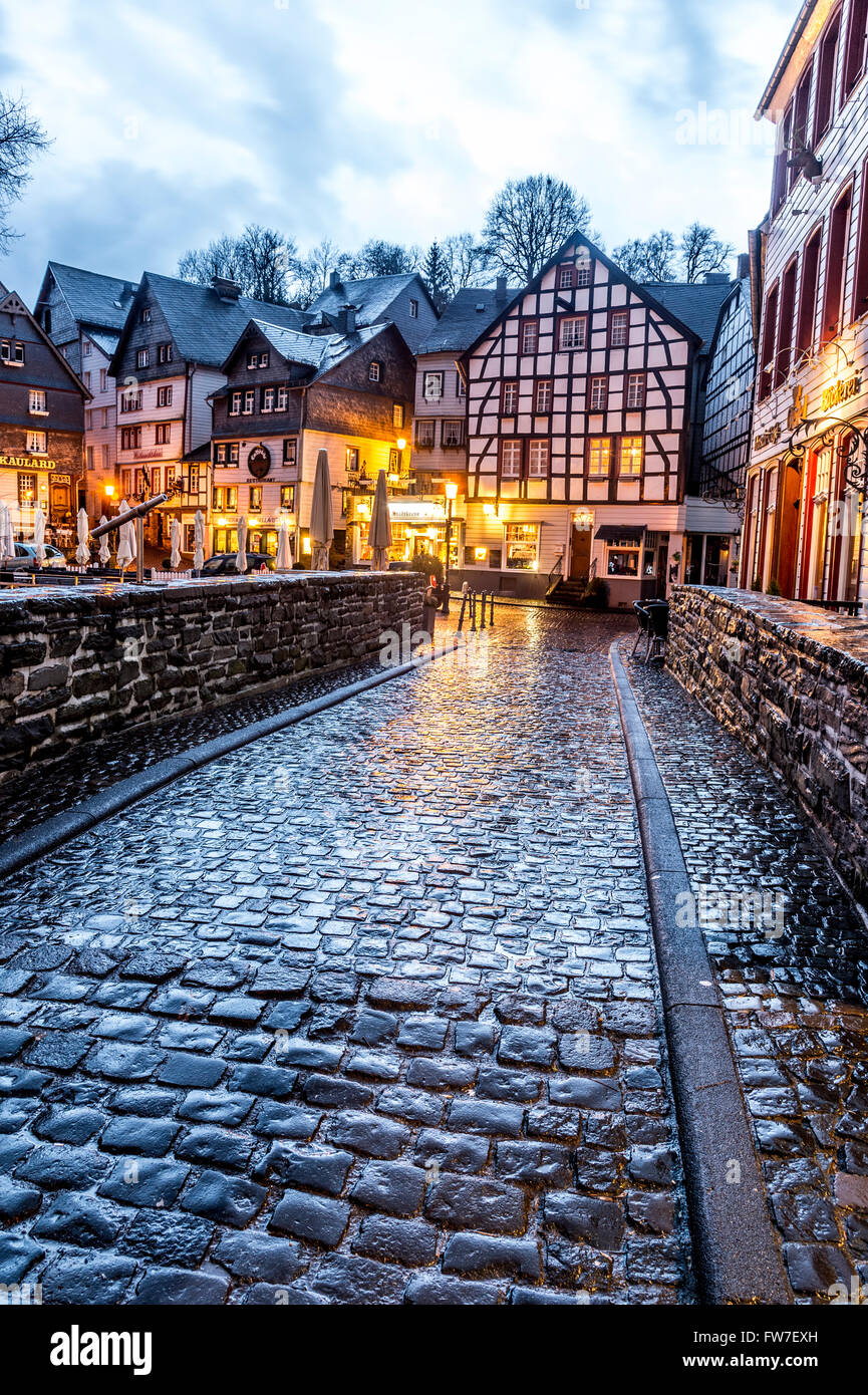 Night-time street scene in the old medieval town of Monschau in ...