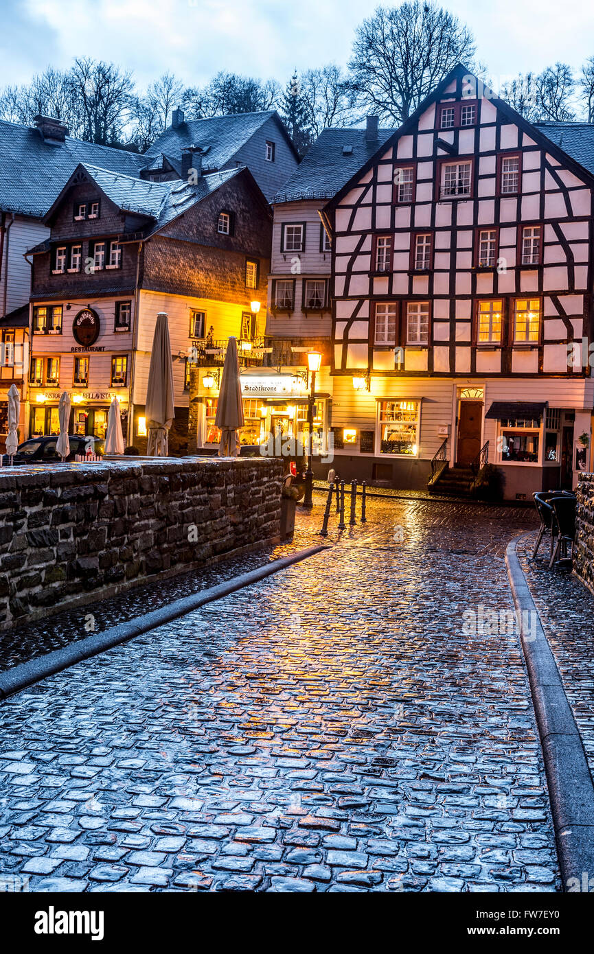 Night-time street scene in the old medieval town of Monschau in ...