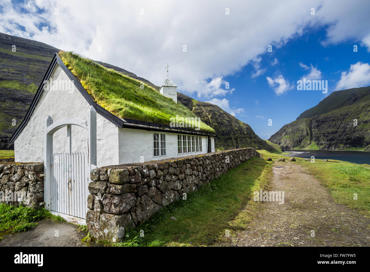 Village church and a lake in Saksun, Faroe Islands, Denmark Stock Photo ...