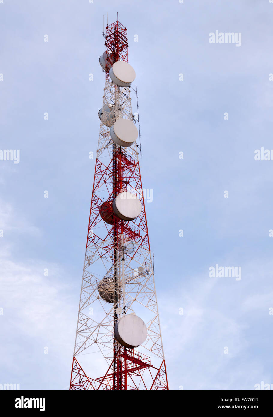 Communication Tower on clear blue sky background Stock Photo - Alamy