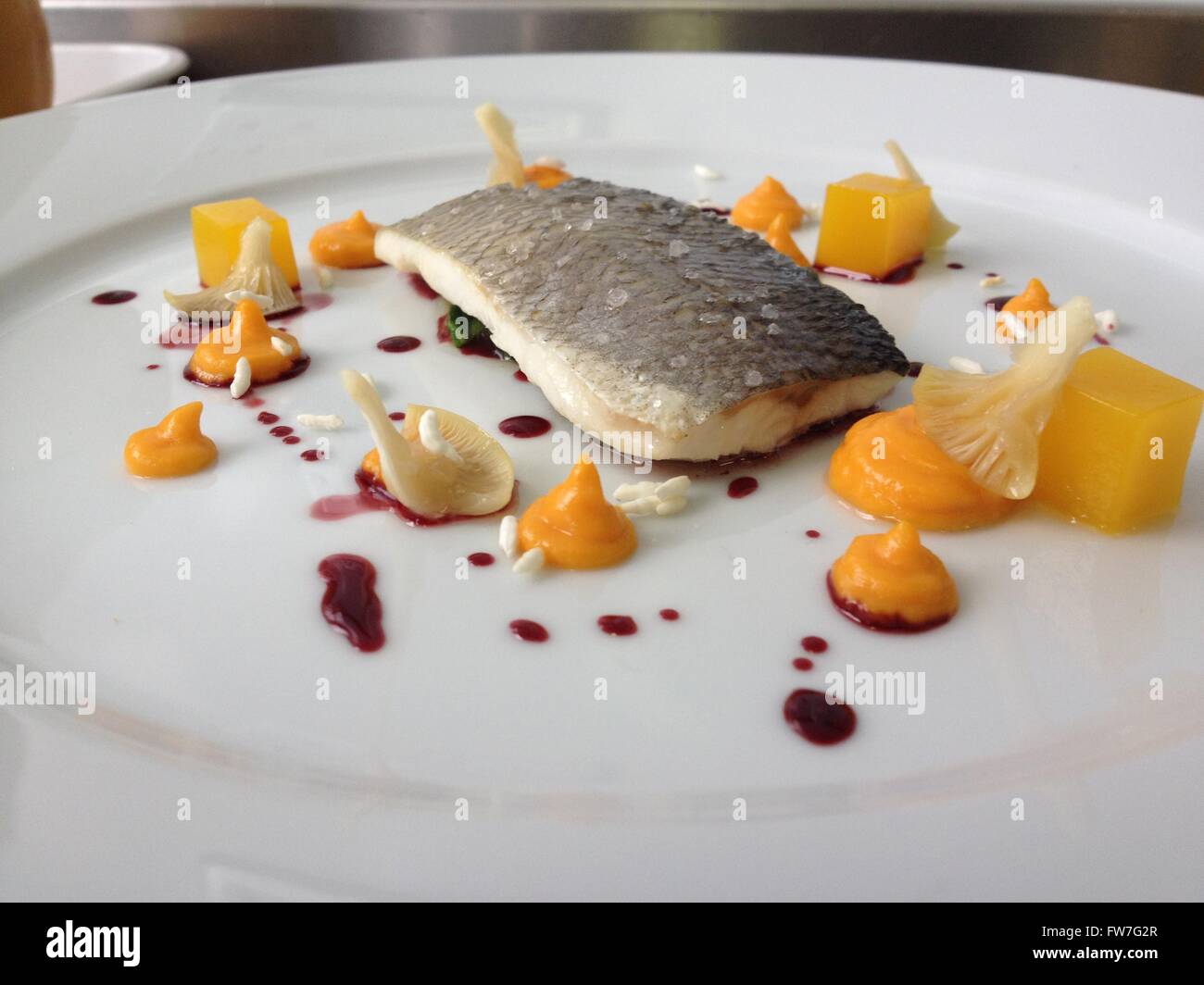 Atlantic Stone Bass, spinach, butternut squash puree, mandarin and ...