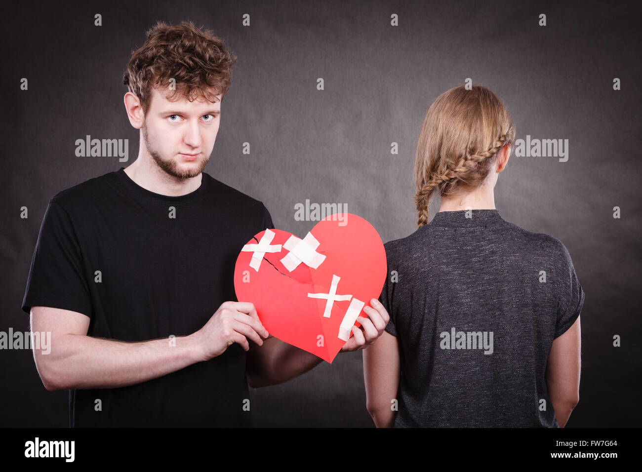 Broken heart difficult love concept. Sad unhappy couple woman and man ...