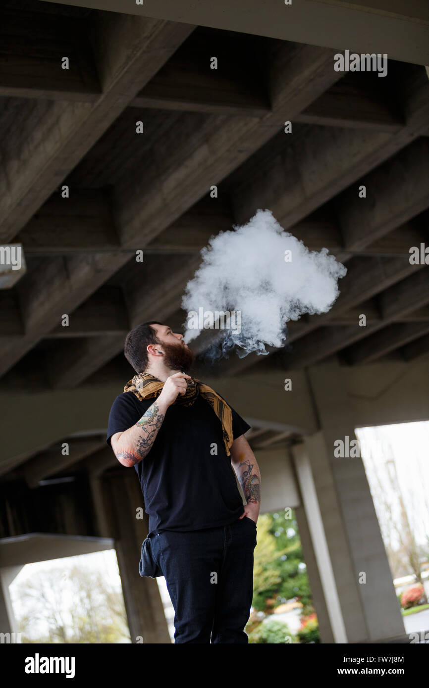 Cool guy smoking hi-res stock photography and images - Alamy