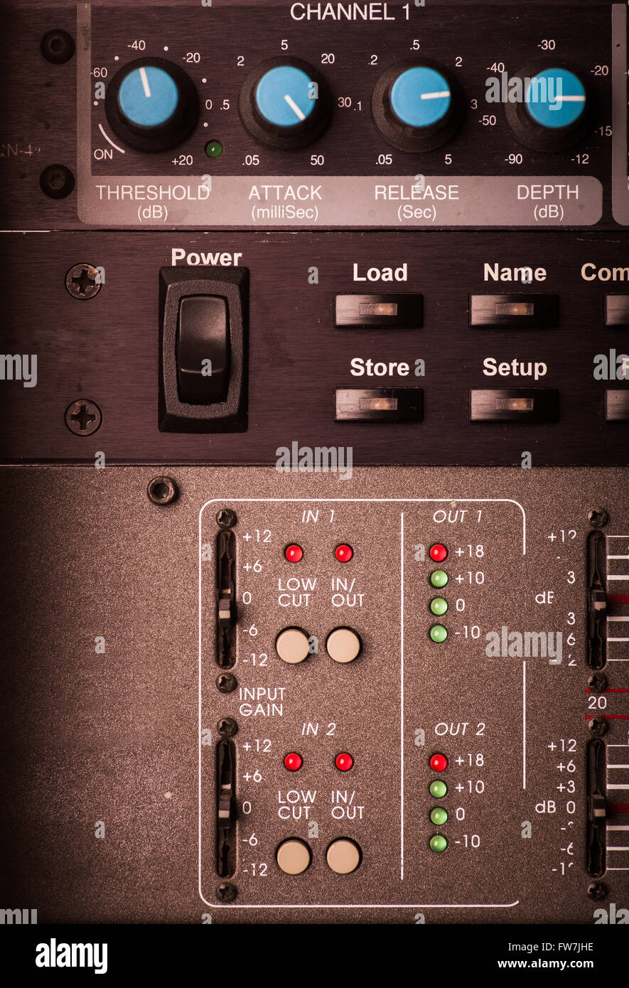 Color image of many buttons on a sound mixer in a recording studio ...