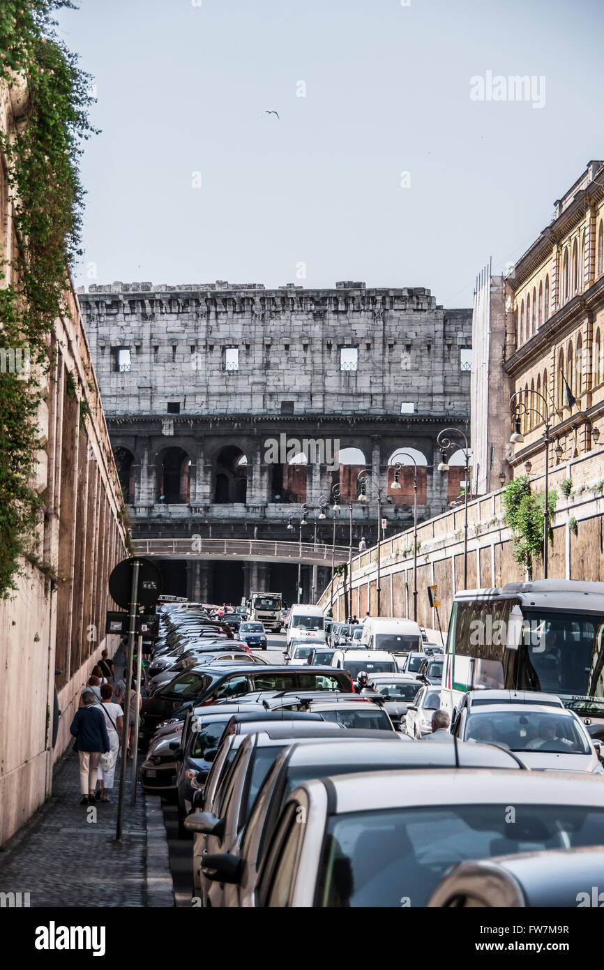 View of the Colosseum from the street, filled with cars Stock Photo - Alamy