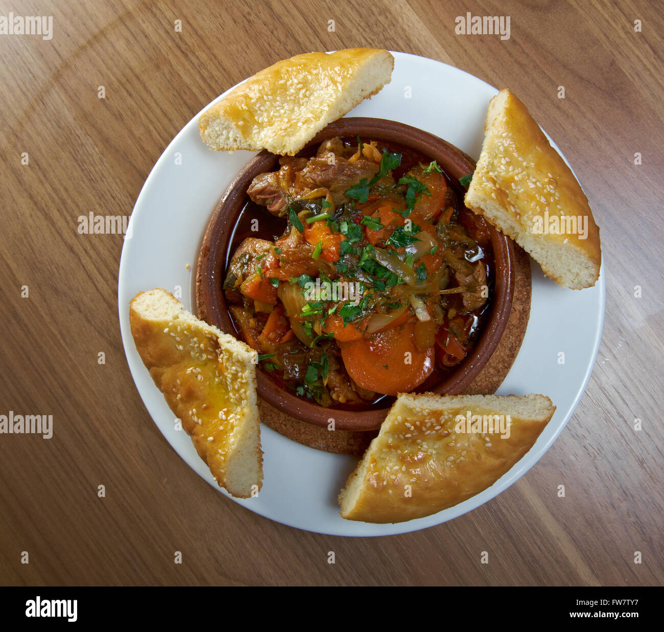 Chanakhi traditional Georgian dish of lamb stew with tomatoes ...