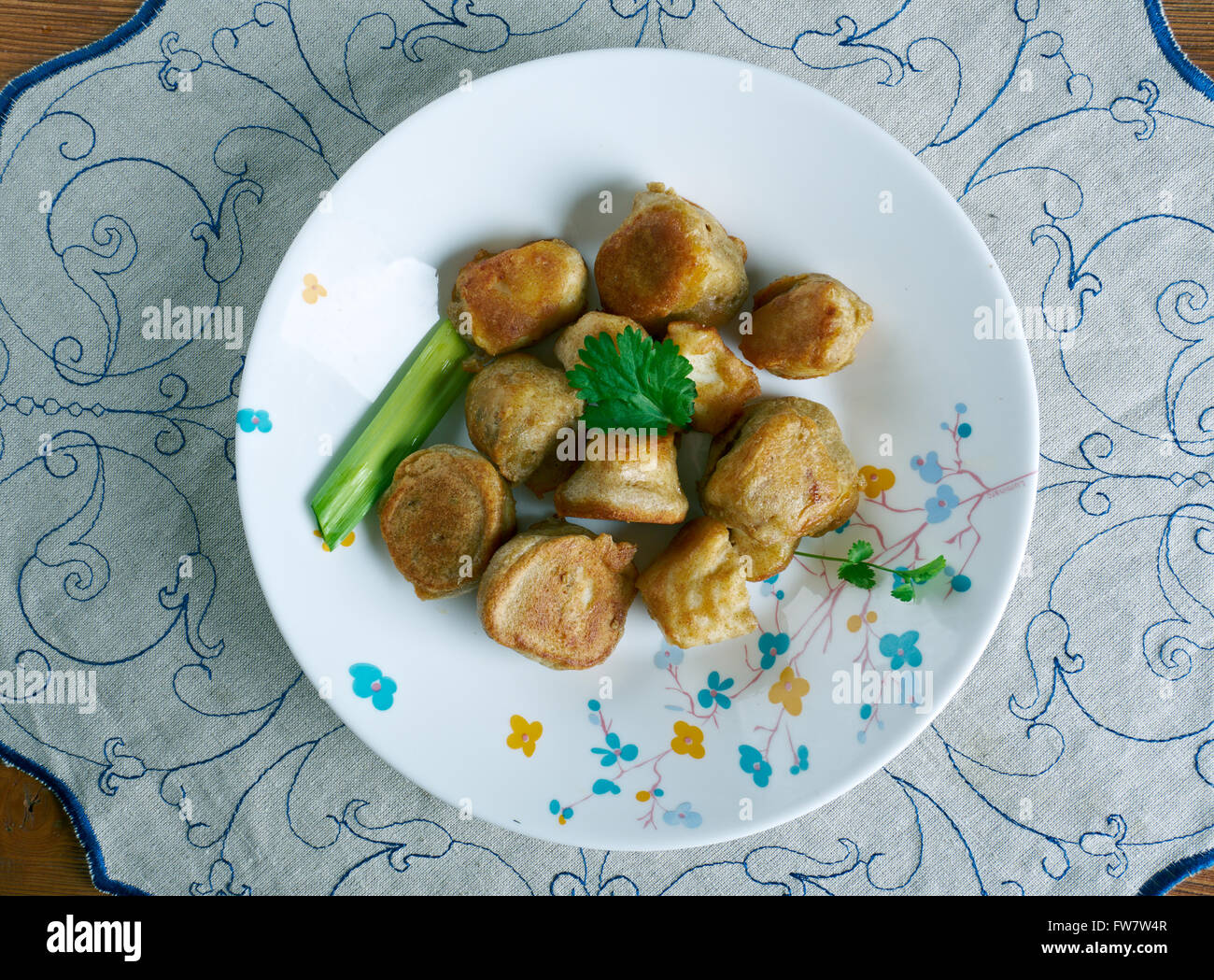 Stamp and Go - fish fritter made with salt fish in Jamaican cuisine ...