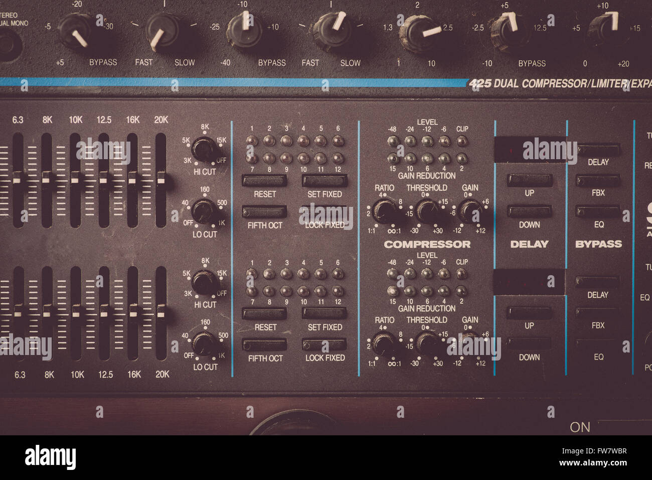 Color image of many buttons on a sound mixer in a recording studio ...