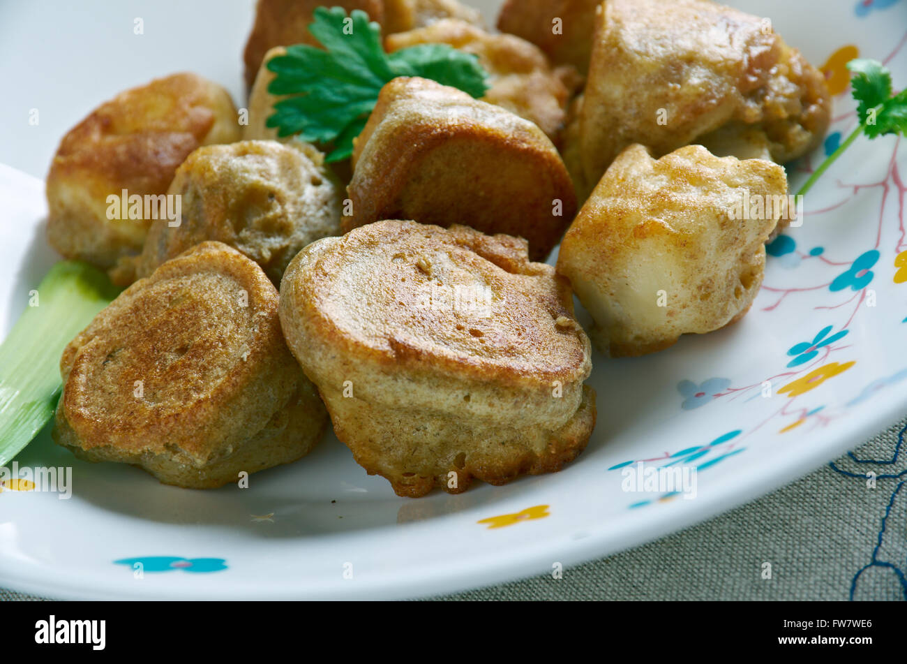 Stamp and Go - fish fritter made with salt fish in Jamaican cuisine ...