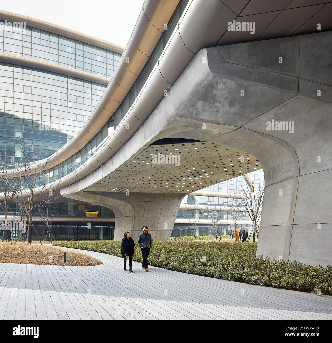 Landscaped walkways and soffit of bridge link. Sky SOHO, Shanghai ...