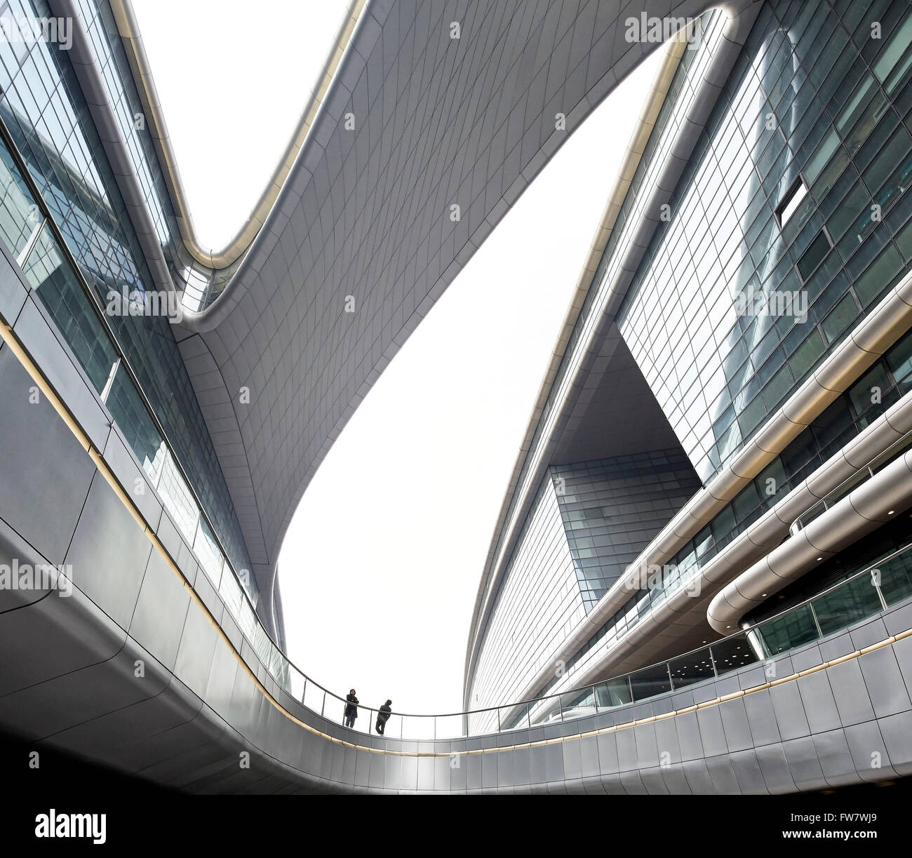 Exterior facade and bridge soffit viewed from below. Sky SOHO, Shanghai ...