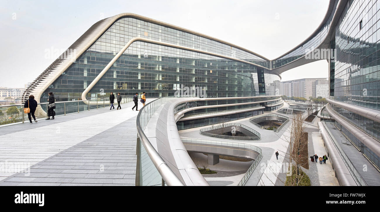 View of multi-level landscaping with walkways, linking bridge and ...