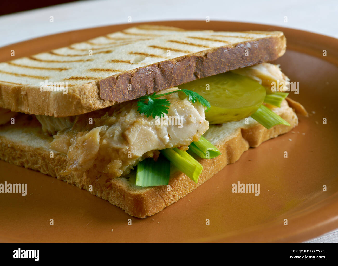 Grilled Cod Sandwiches with pickles. close up Stock Photo - Alamy