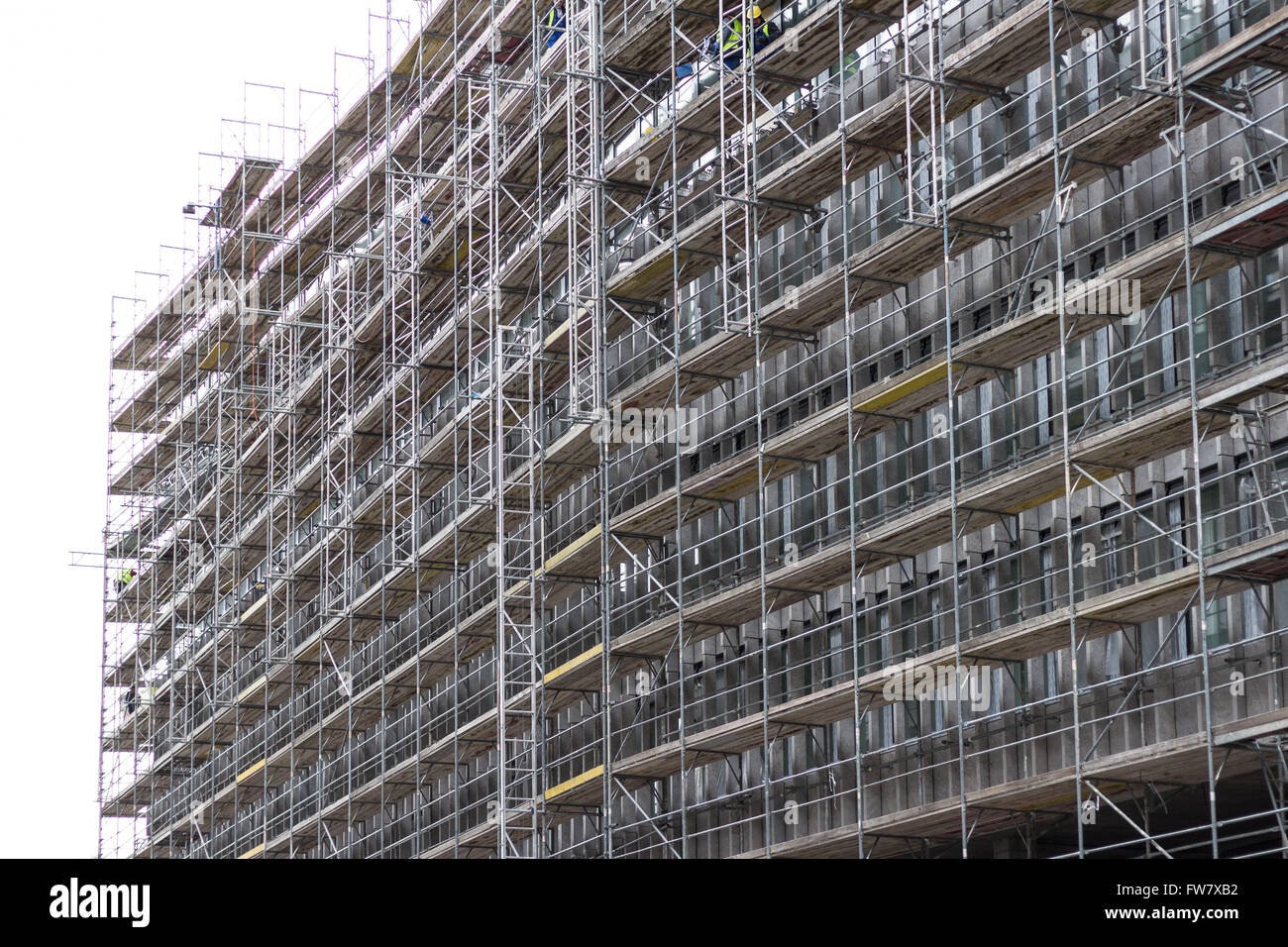 huge building facade with scaffolding - construction site Stock Photo ...
