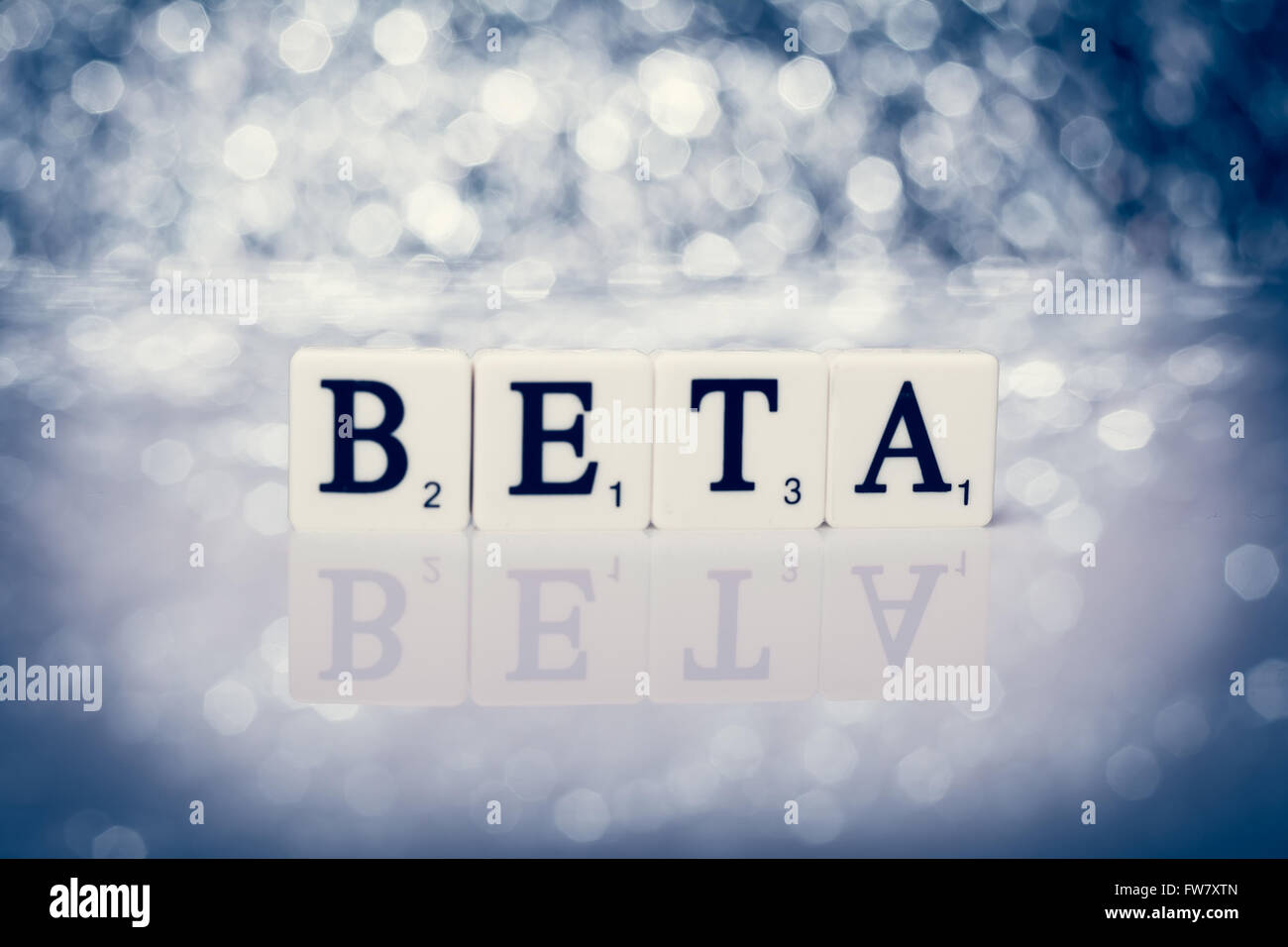Written word of tiles with letters - beta Stock Photo - Alamy