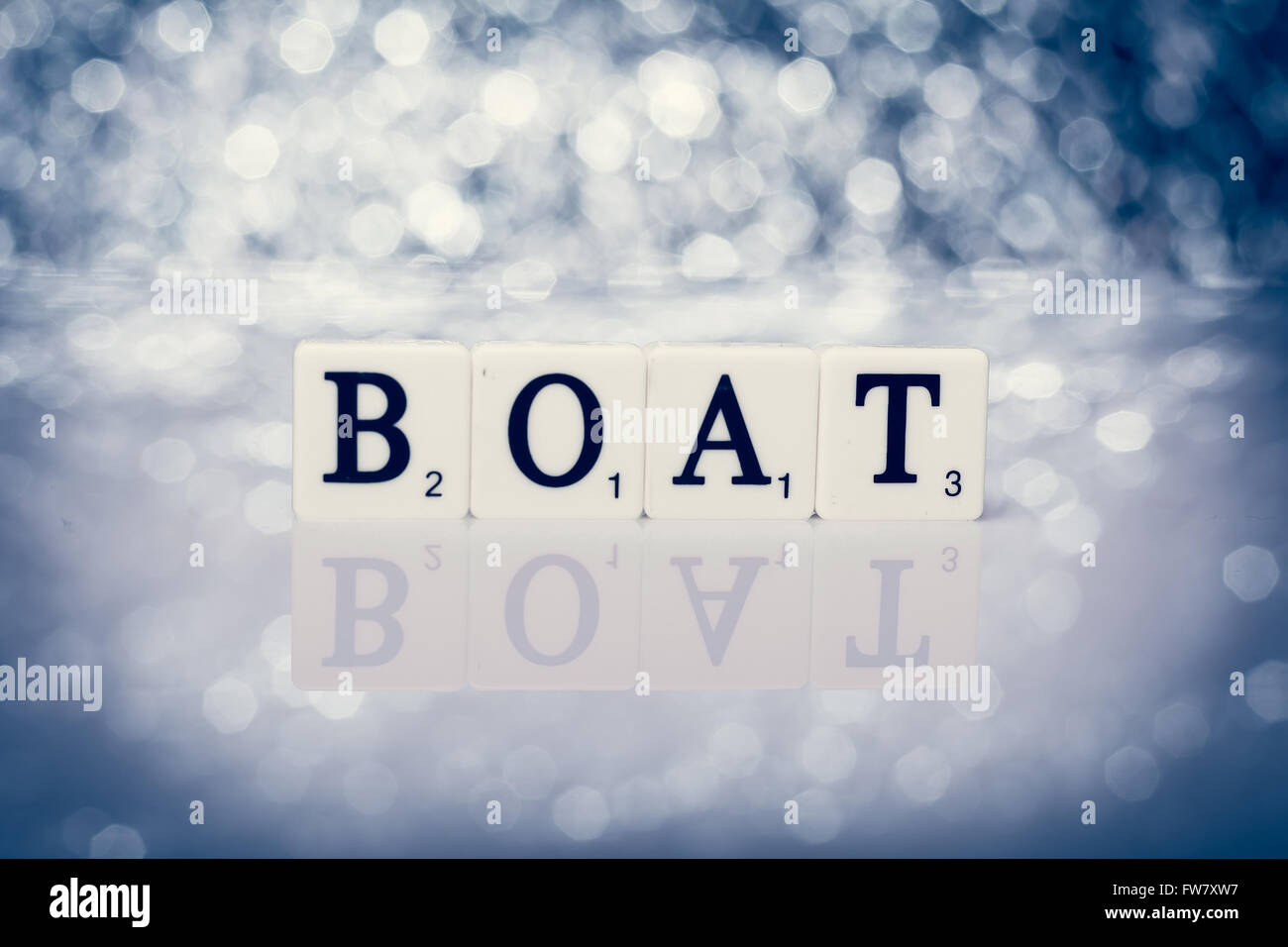 Written word of tiles with letters - boat Stock Photo - Alamy