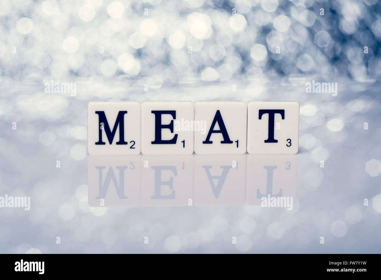 Written word of tiles with letters - meat Stock Photo - Alamy