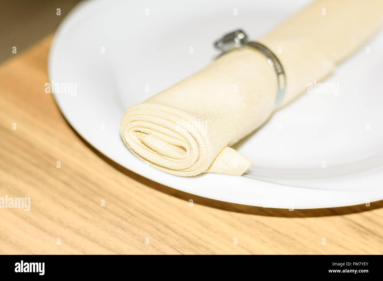 Textile napkin in a restaurant with clamp Stock Photo - Alamy