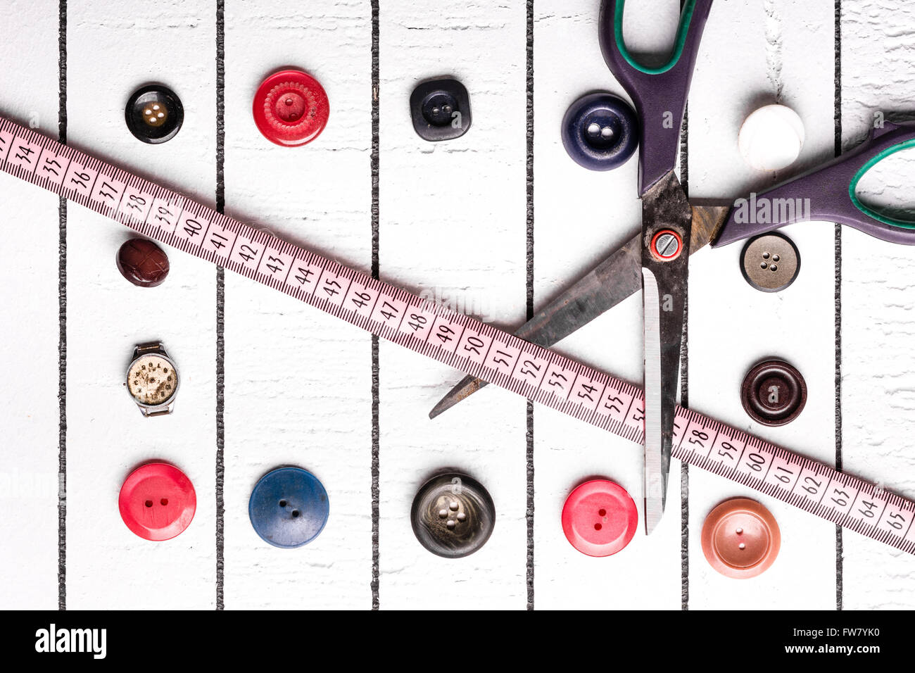 Buttons, centimeter, scissors. Set for cutting and creating clothes ...