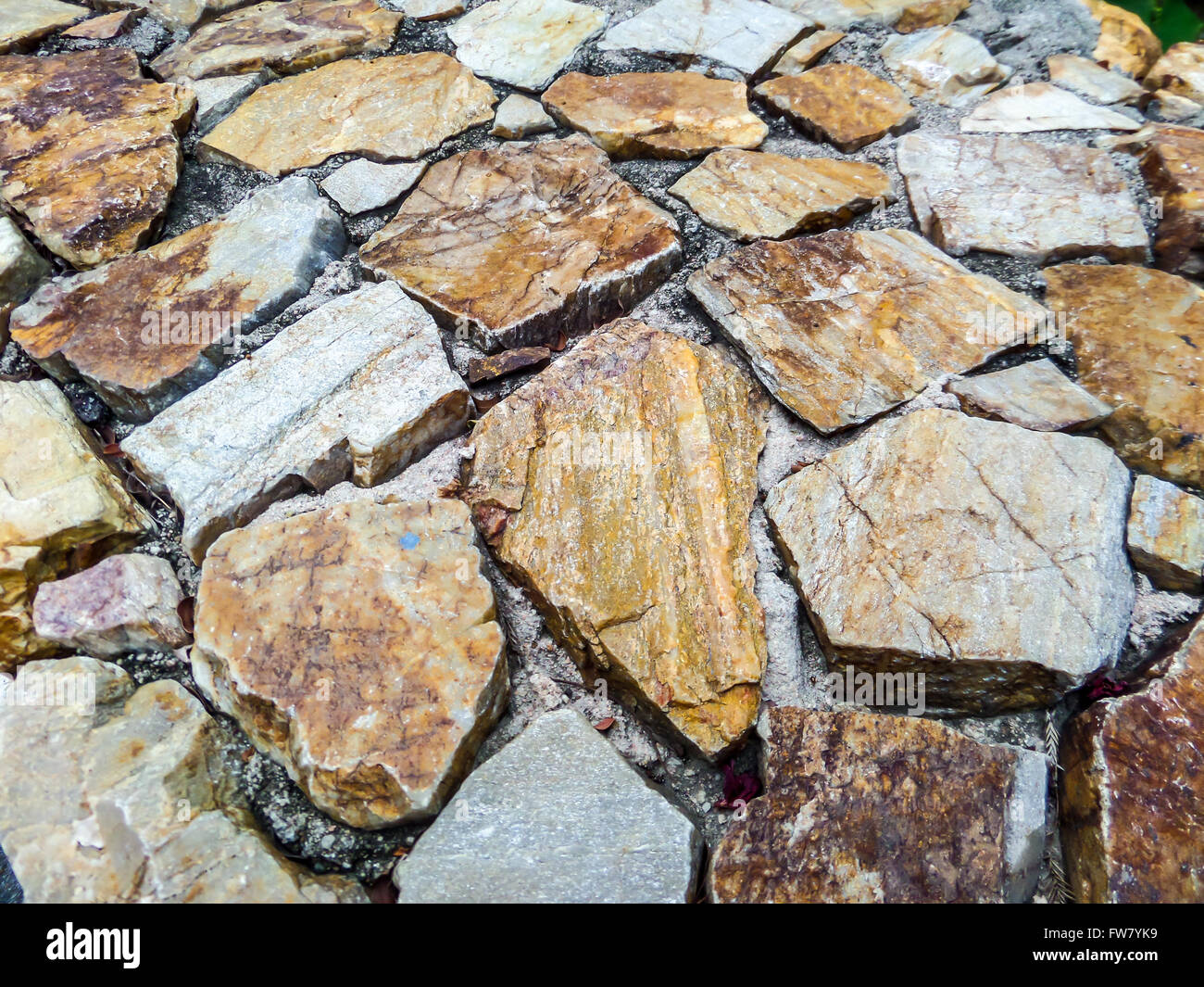 Stone wall and earth tone color Stock Photo - Alamy