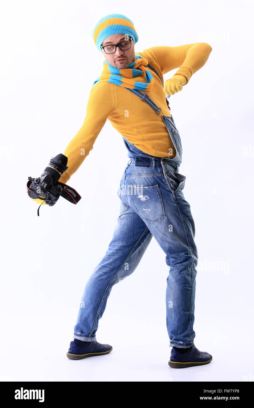 Boy in overalls holding hi-res stock photography and images - Alamy