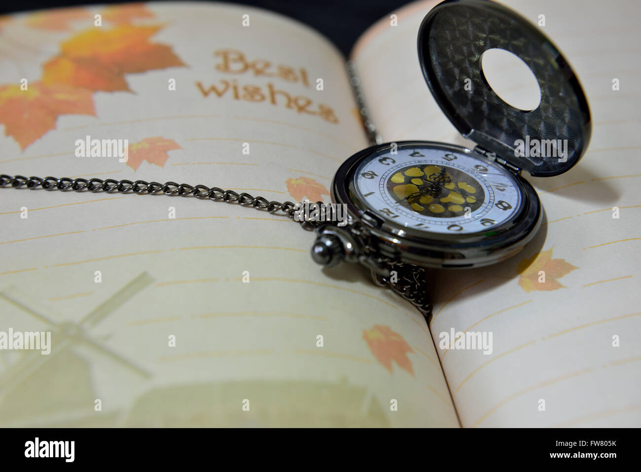 Pocket watch book stack hi-res stock photography and images - Alamy