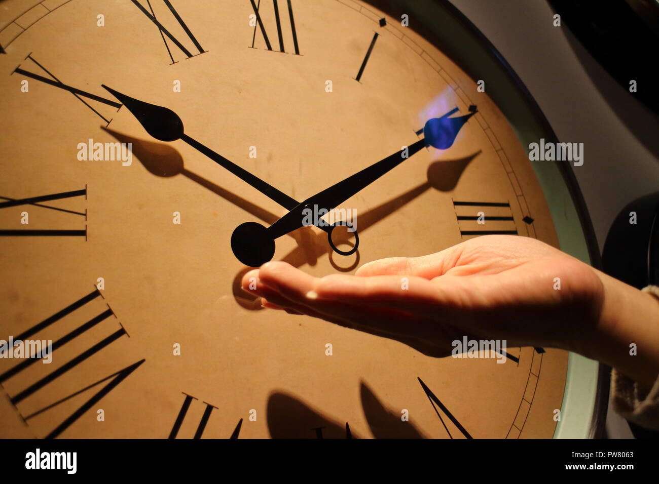 Hold your time Stock Photo - Alamy