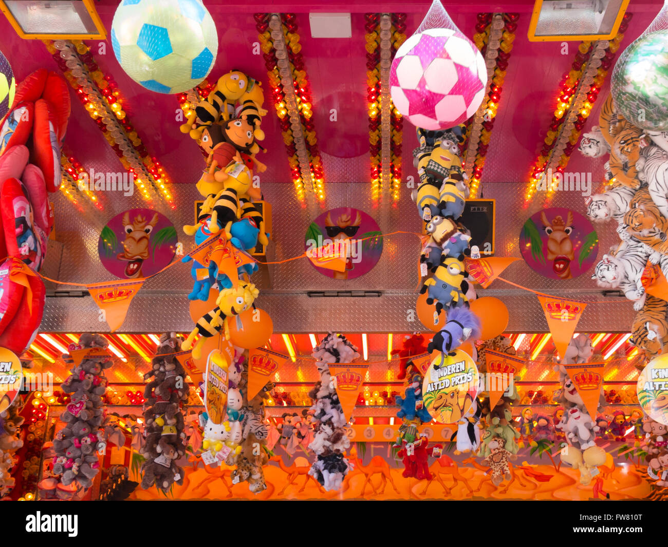 Toys and prizes in sidestall on fun fair on King's Day in the ...