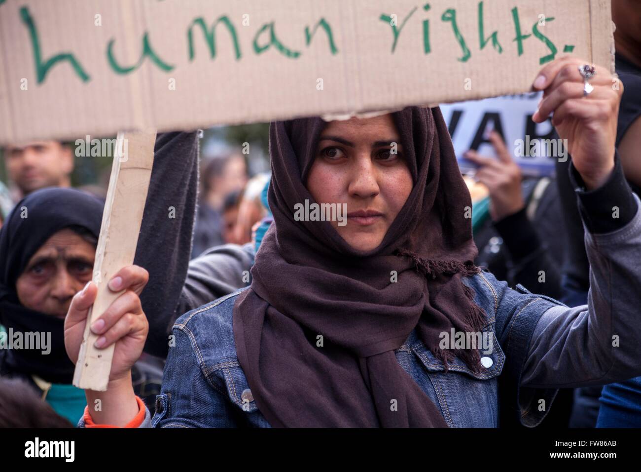 Afghan refugees protest in Athens against closed European borders. Sign ...