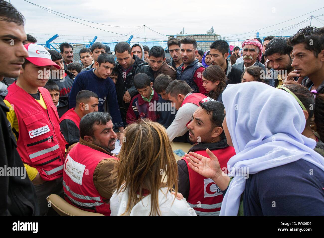 blanket distribution by a Muslim NGO to refugees in Ashdi refugee camp ...