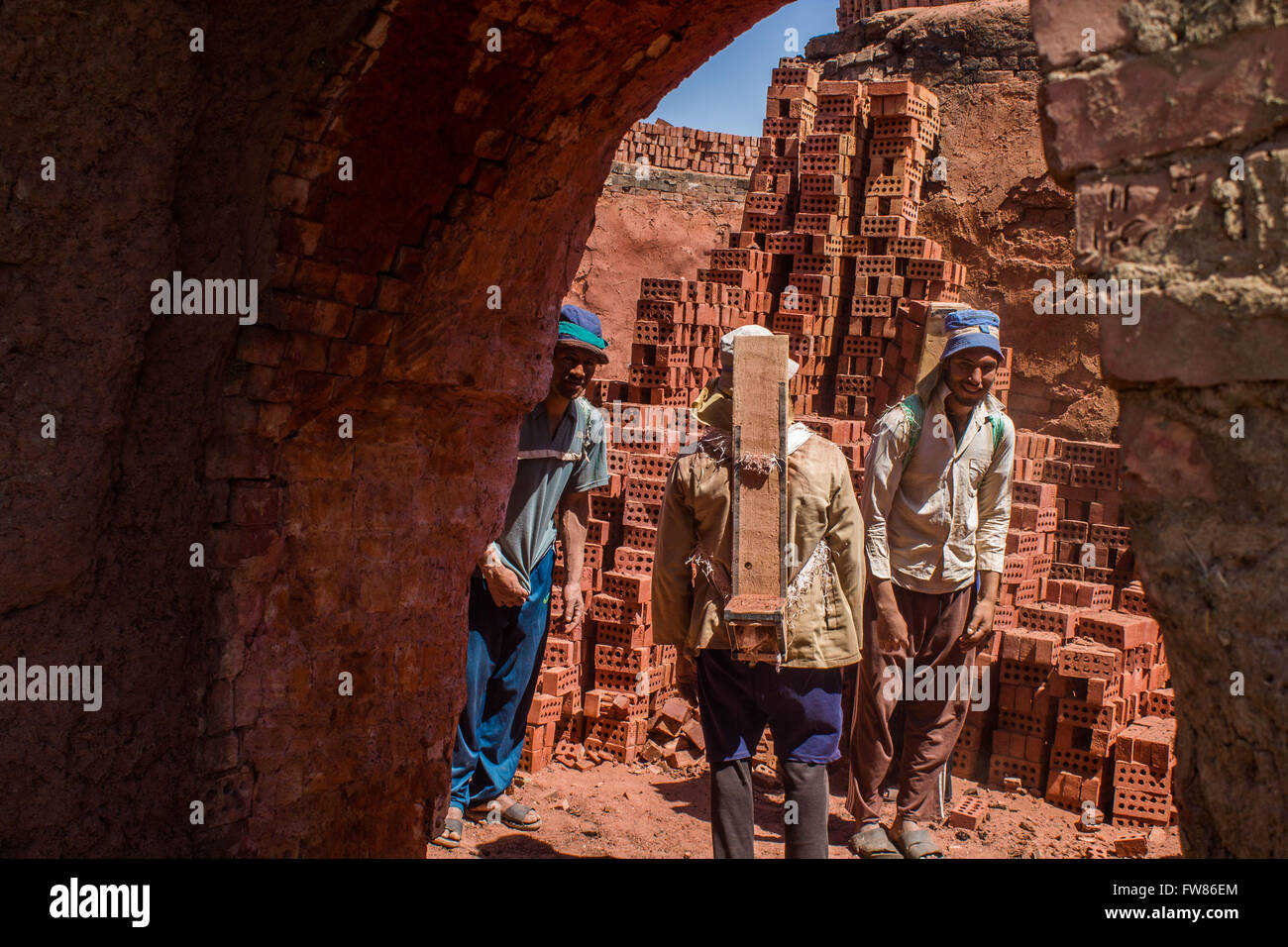 April 1, 2016 - Red-brick factory workers transporting bricks from the ...