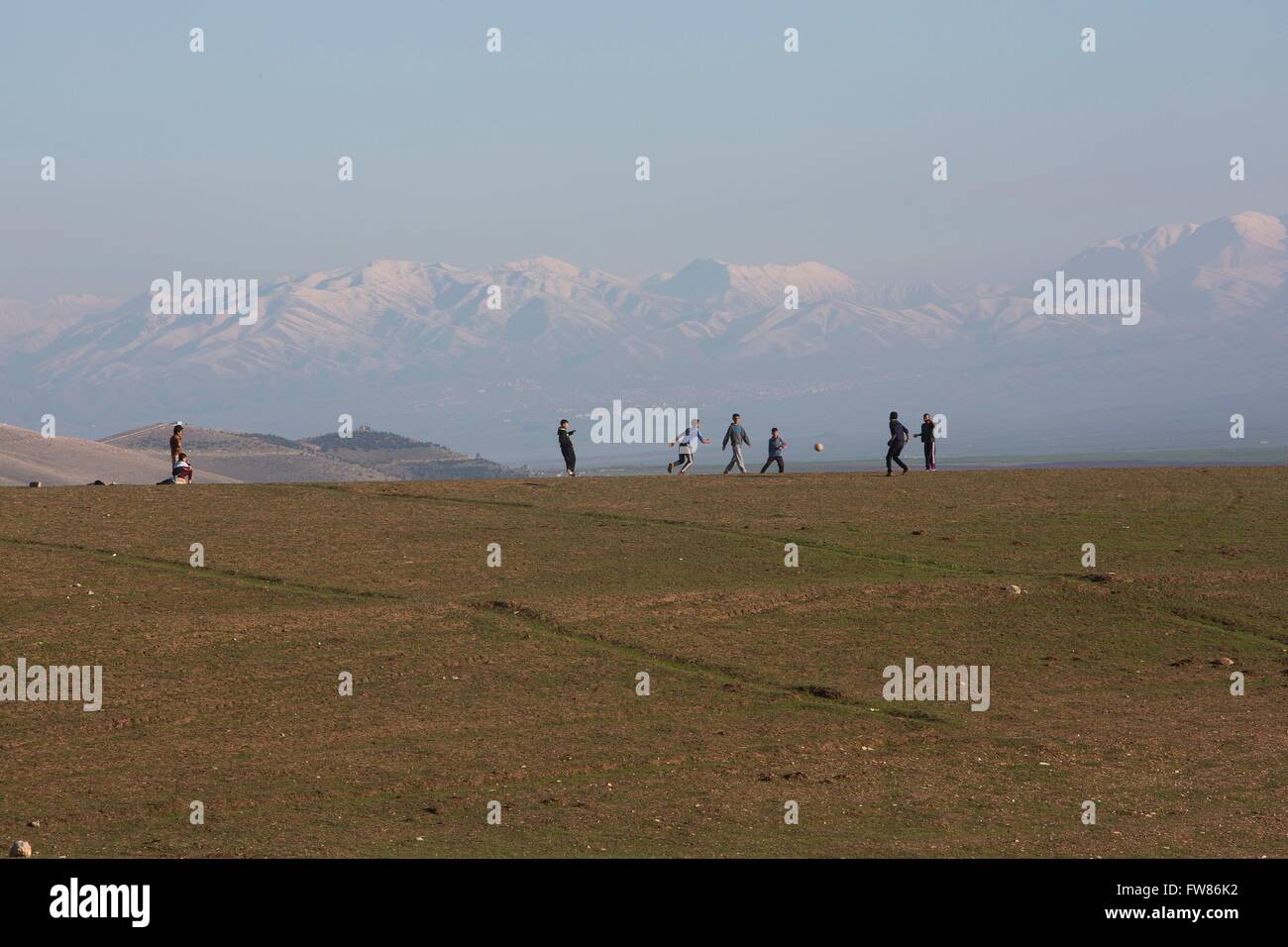 Children playing football in iraq hi-res stock photography and images ...