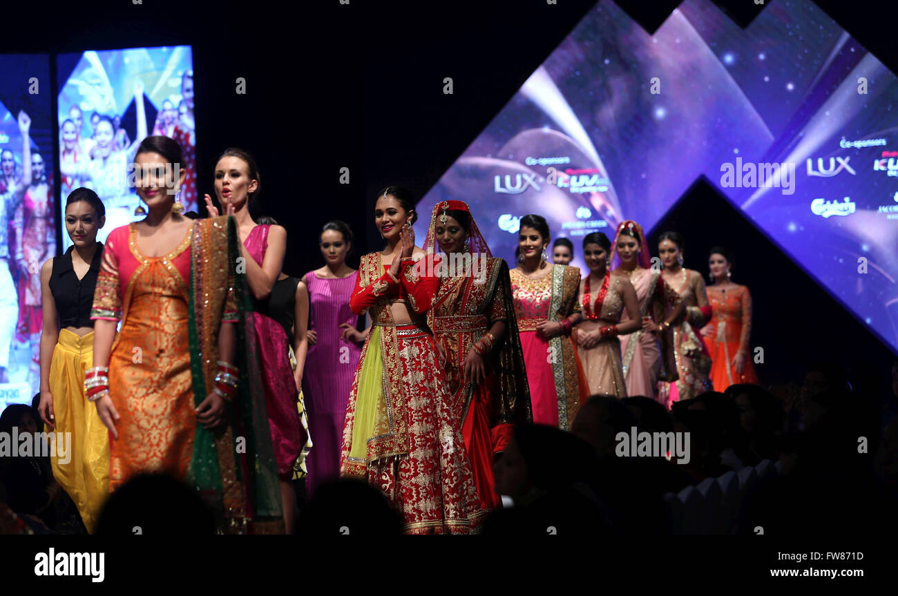 Kathmandu, Nepal. 31st Mar, 2016. Models walk on the ramp wearing ...