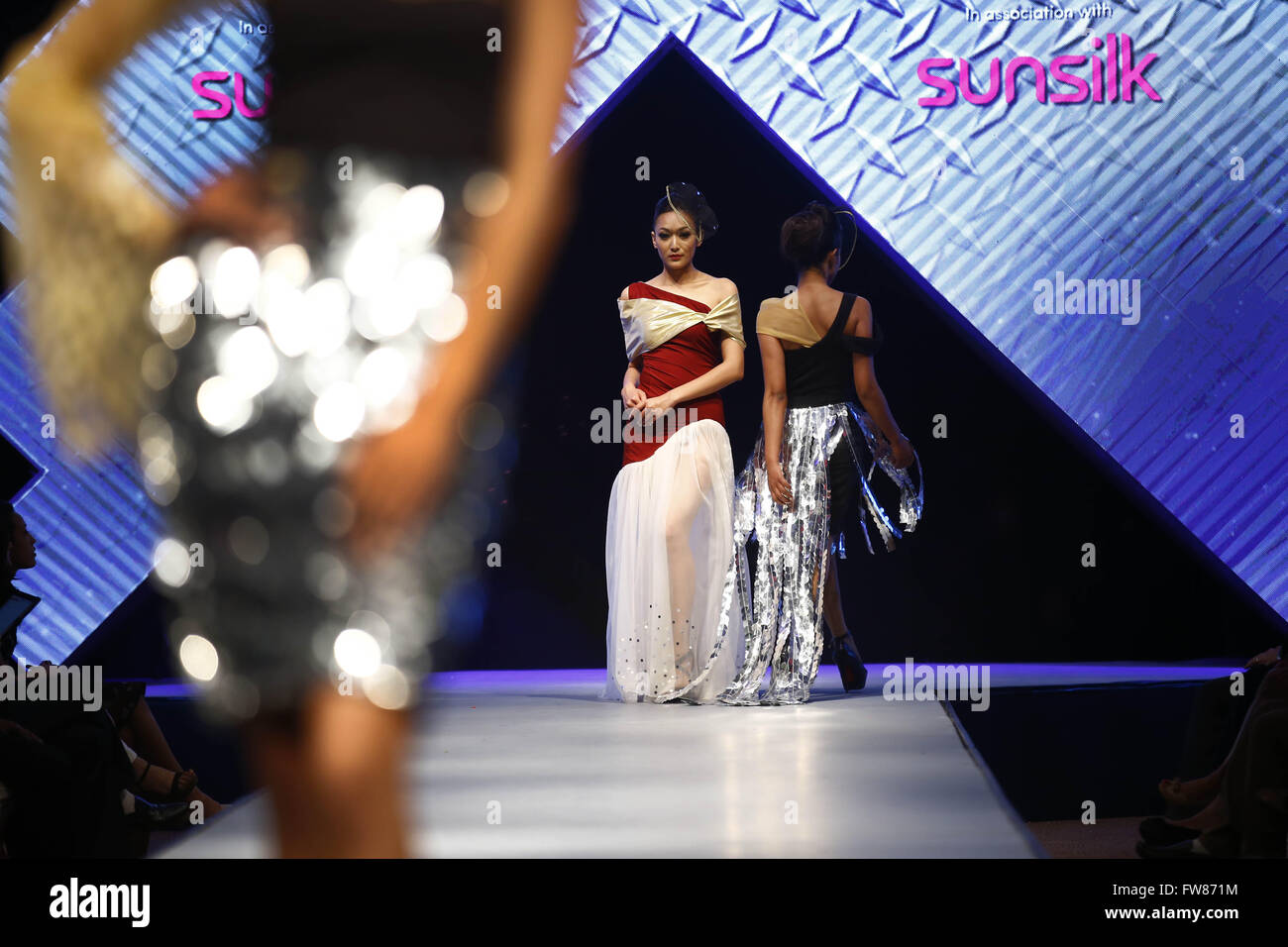 Kathmandu, Nepal. 31st Mar, 2016. Nepalese models catwalk on the runway ...