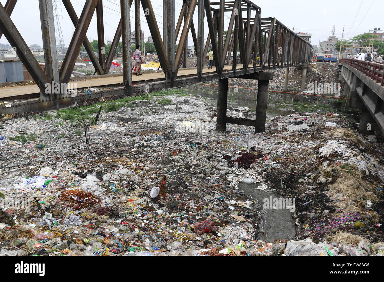 Dhaka, 01 April 2016. Dumping of garbage and waste under the bailey and ...