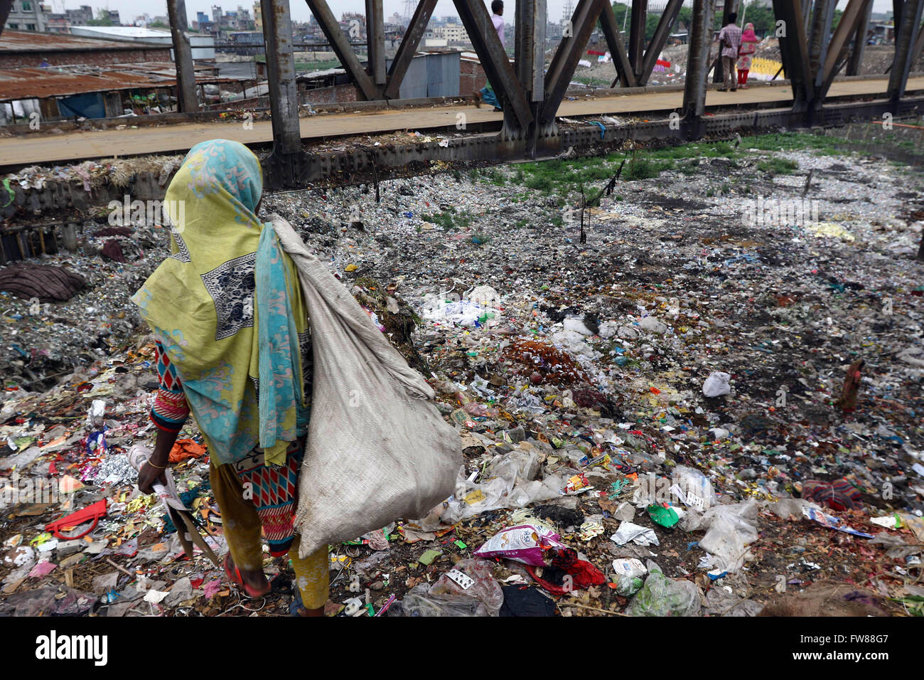 Dhaka, 01 April 2016. Dumping of garbage and waste under the bailey and ...