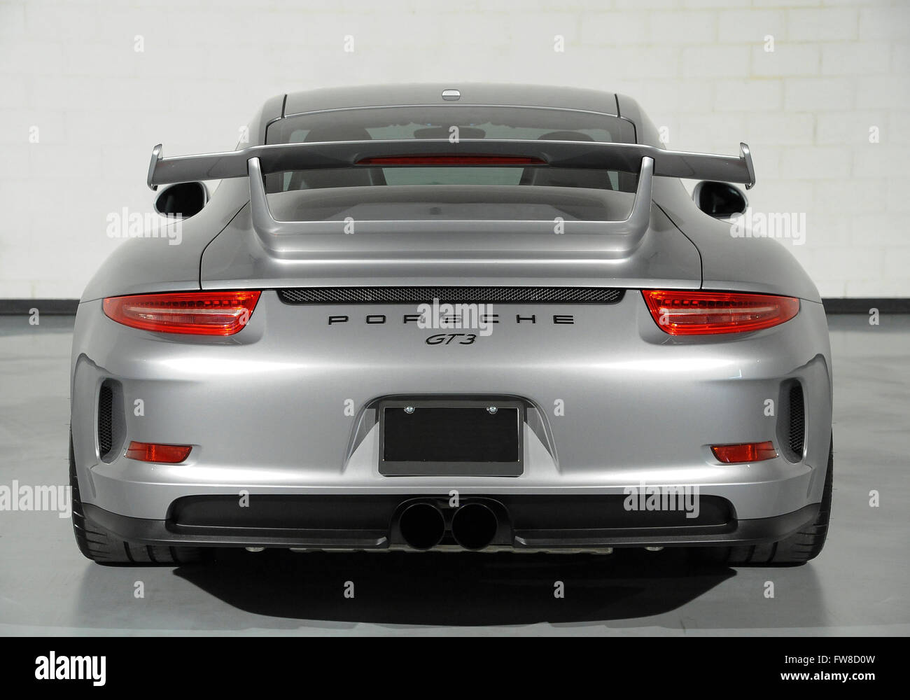 April 1, 2016: A 2015 Porsche GT3 with custom spoiler and leather ...
